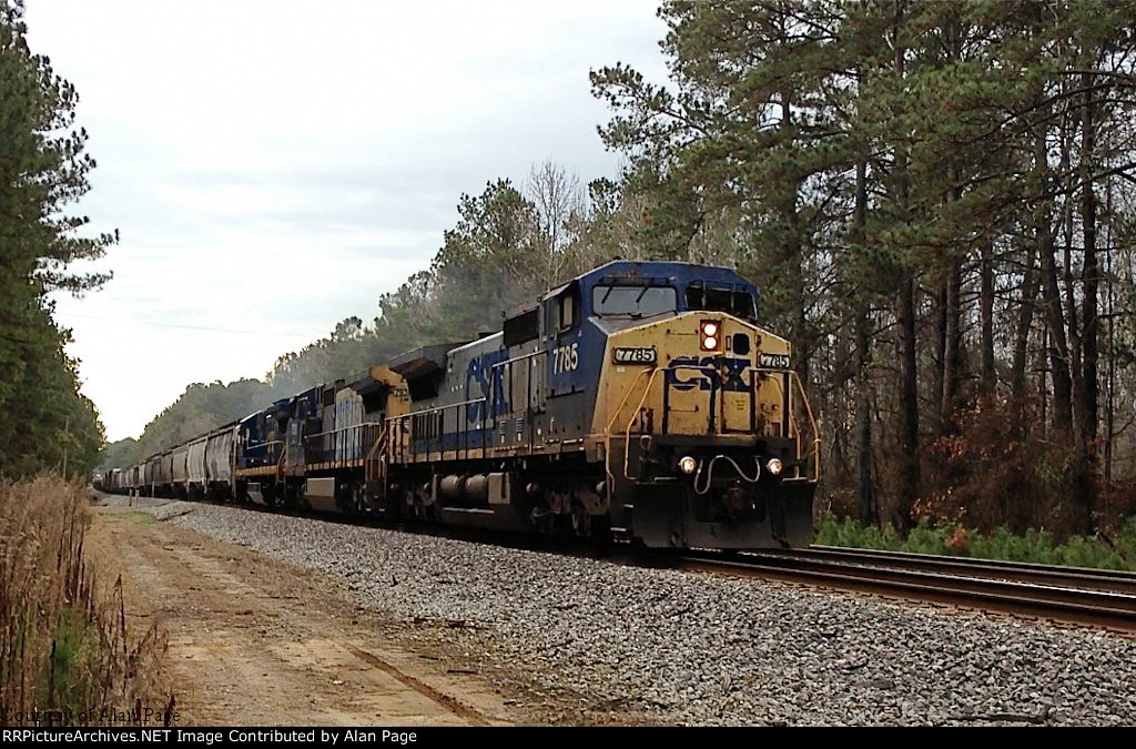 CSX C40-8W’s 7785 and 7838, and B40-8 5941, hustle covered hoppers